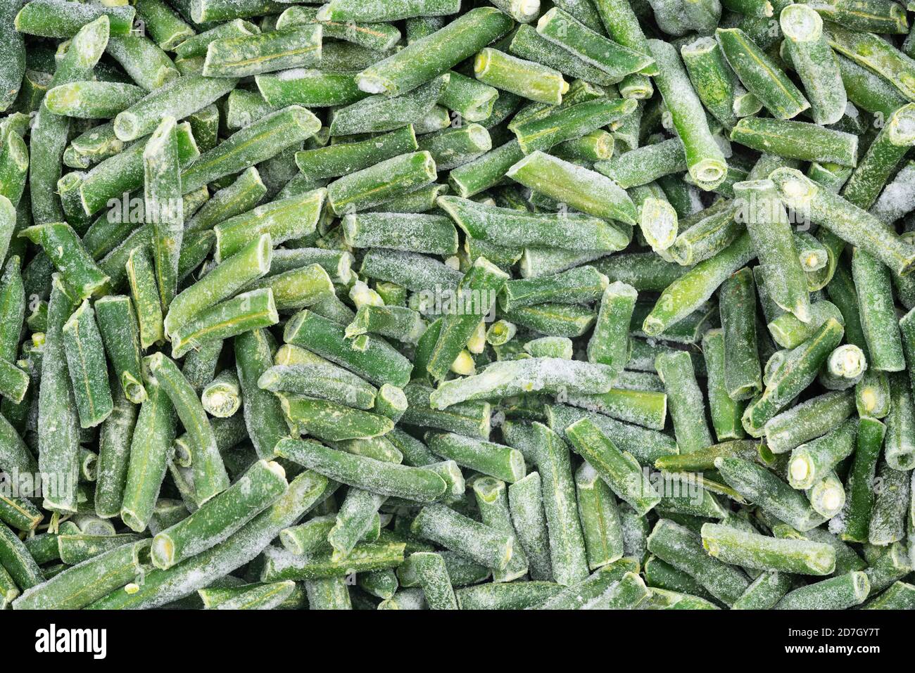 Frozen chopped green string beans texture background. iced beans ...