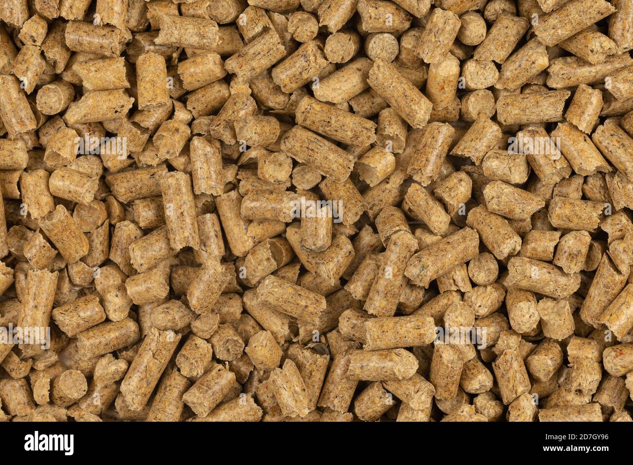 Brown wood pellets texture background. natural pile of wood pellets ...