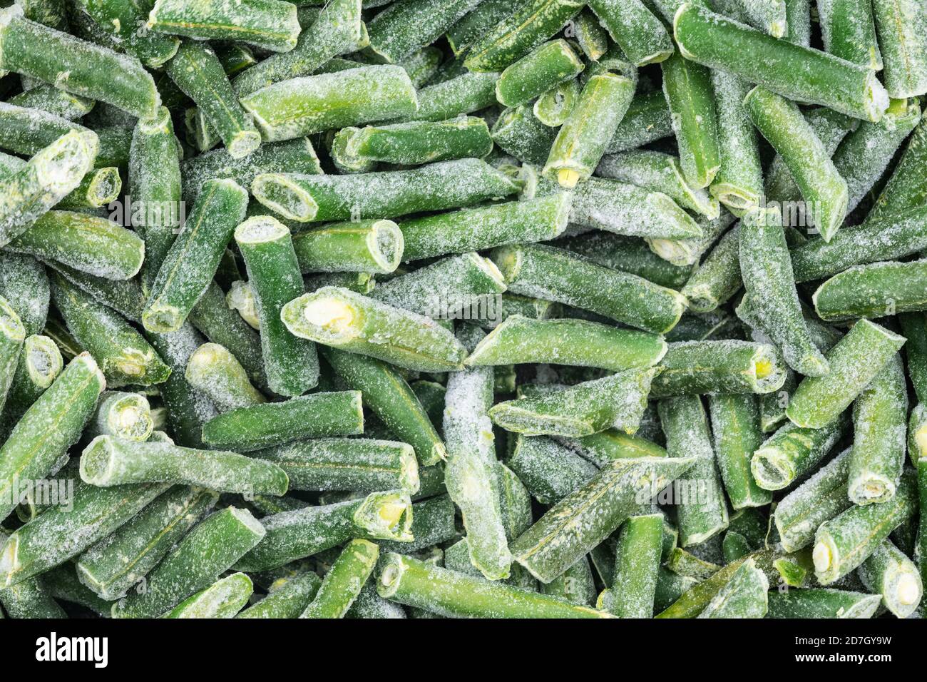 Frozen chopped green string beans texture background. iced beans ...
