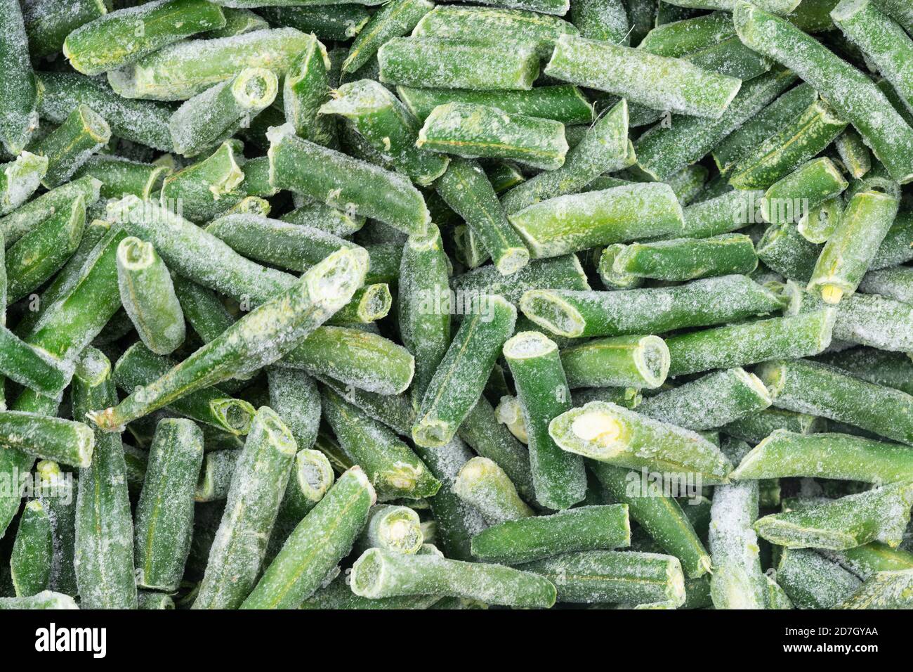 Frozen chopped green string beans texture background. iced beans ...