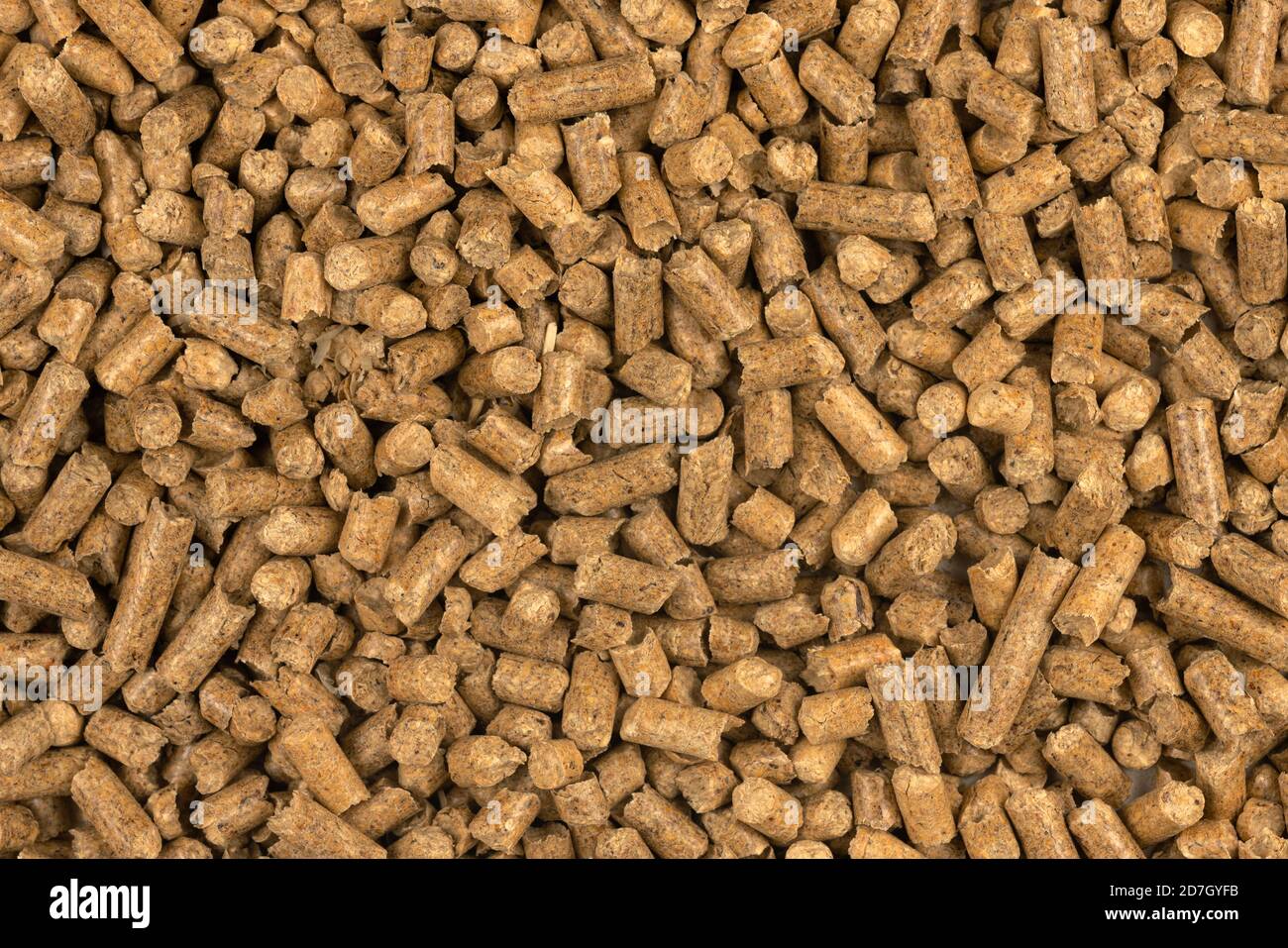 Brown wood pellets texture background. natural pile of wood pellets ...