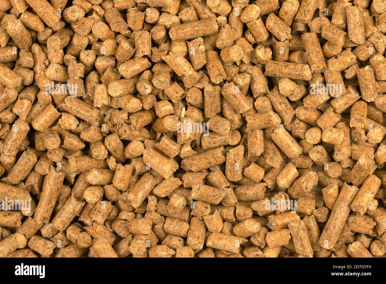 Brown wood pellets texture background. natural pile of wood pellets ...