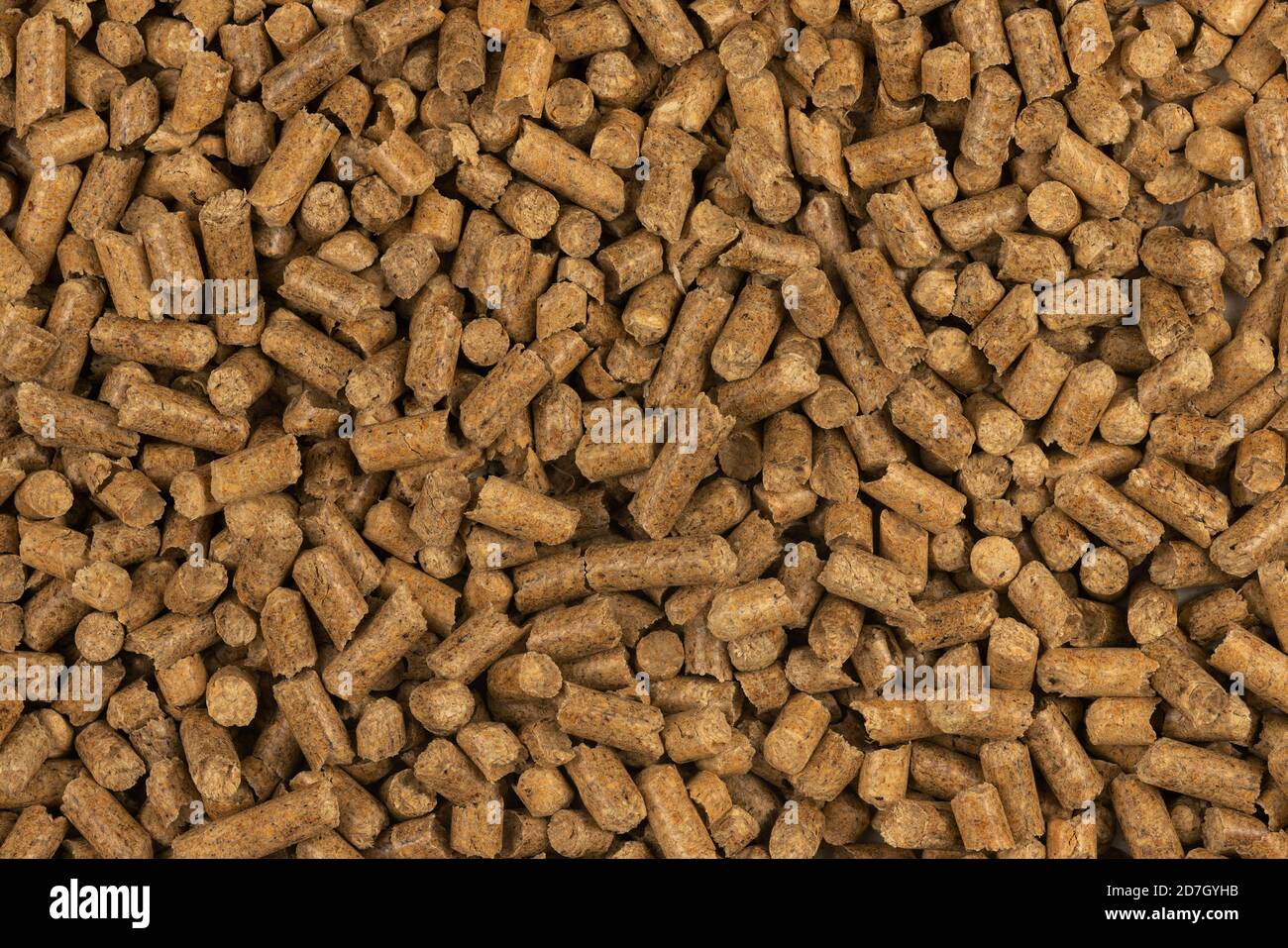 Brown wood pellets texture background. natural pile of wood pellets ...
