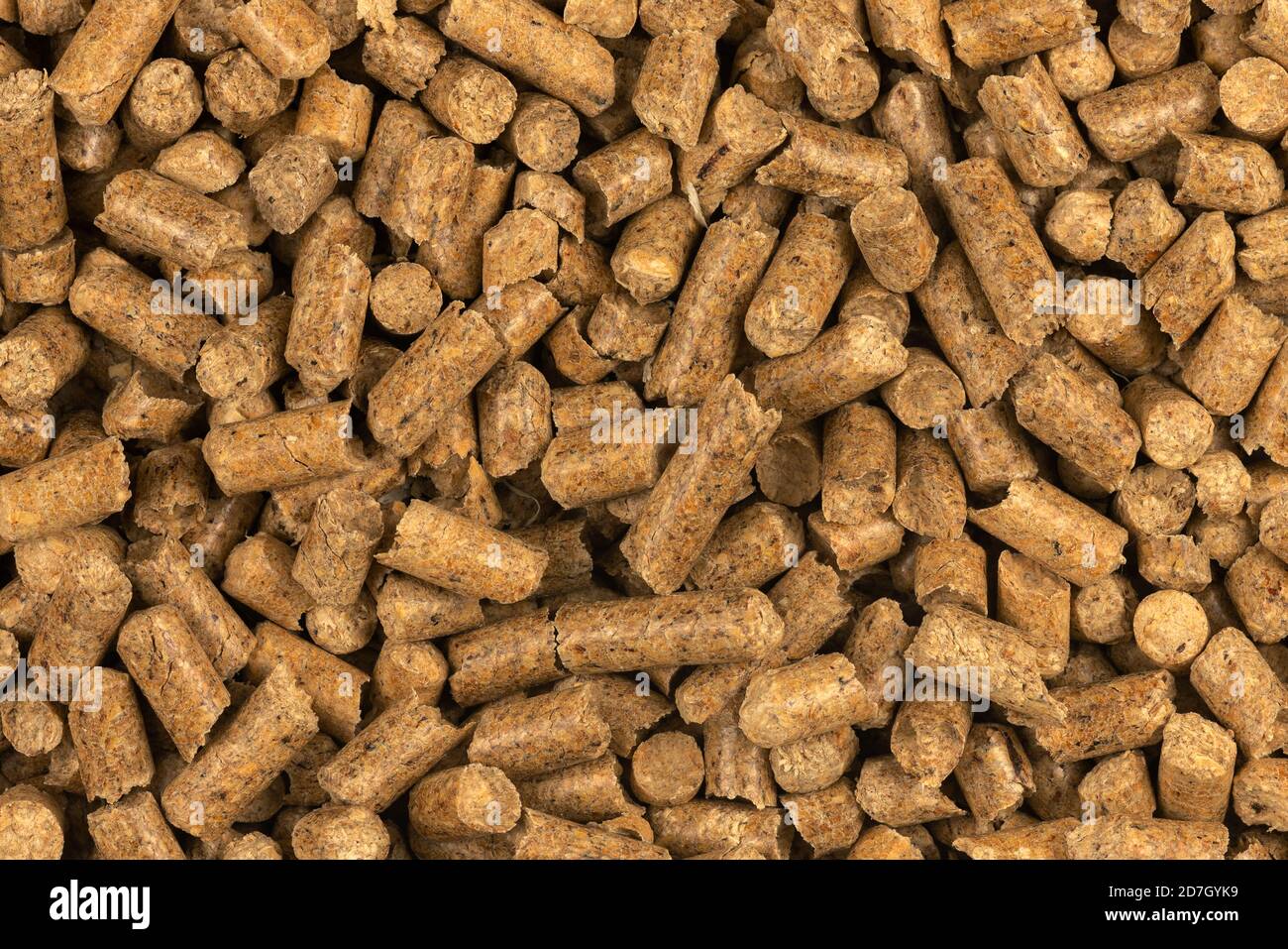 Brown wood pellets texture background. natural pile of wood pellets ...