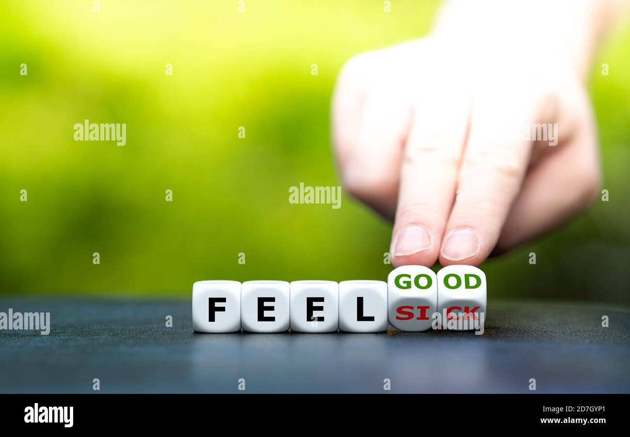 Hand turns dice and changes the expression "feel sick" to "feel good ...