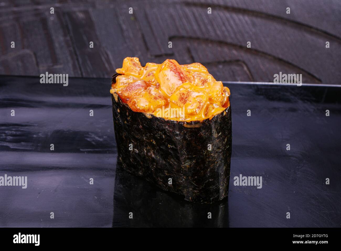 Japanese cuisine - Spicy Gunkan with fish Stock Photo - Alamy