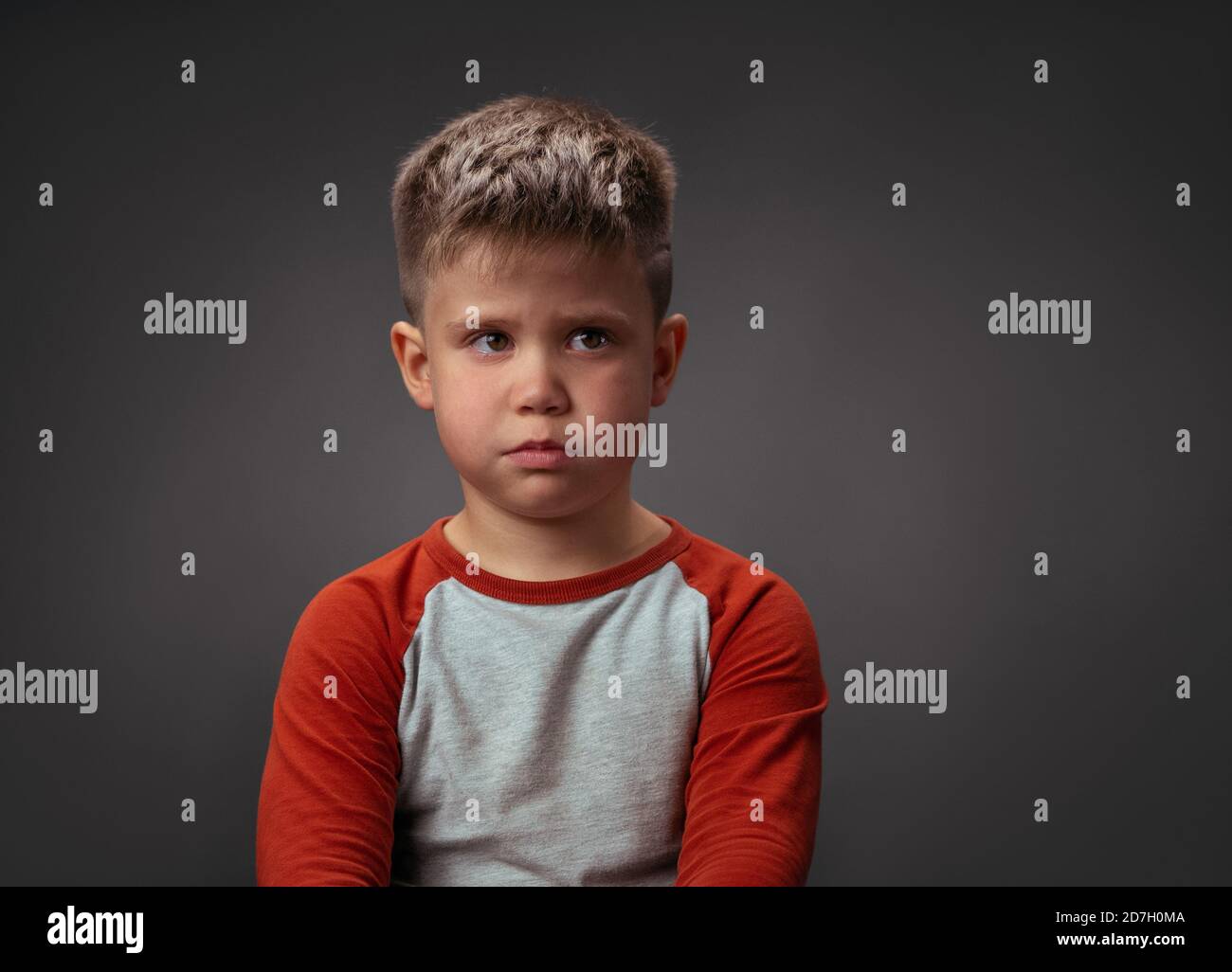Sad boy looking at camera. Preschool kid expresses emotions. Isolated ...