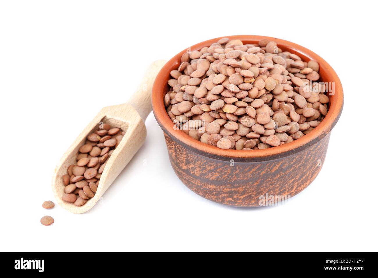 Grains of lentils in a bowl isolated on a white background Stock Photo ...