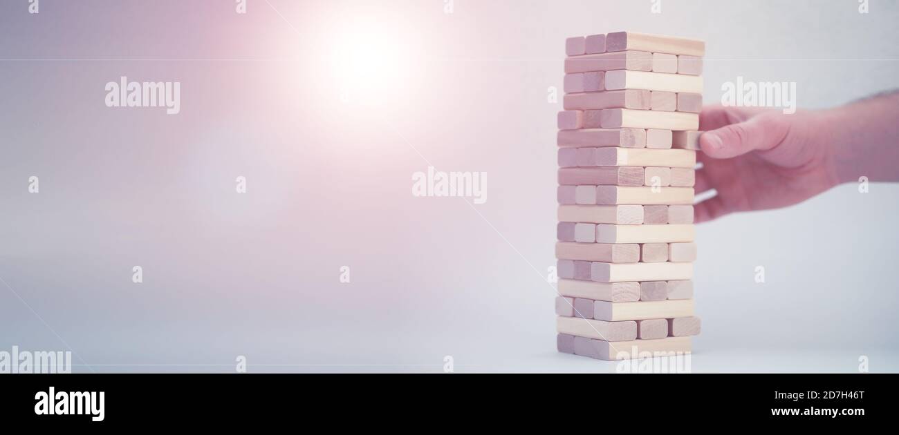 Board game brick tower of light wood sticks Stock Photo - Alamy