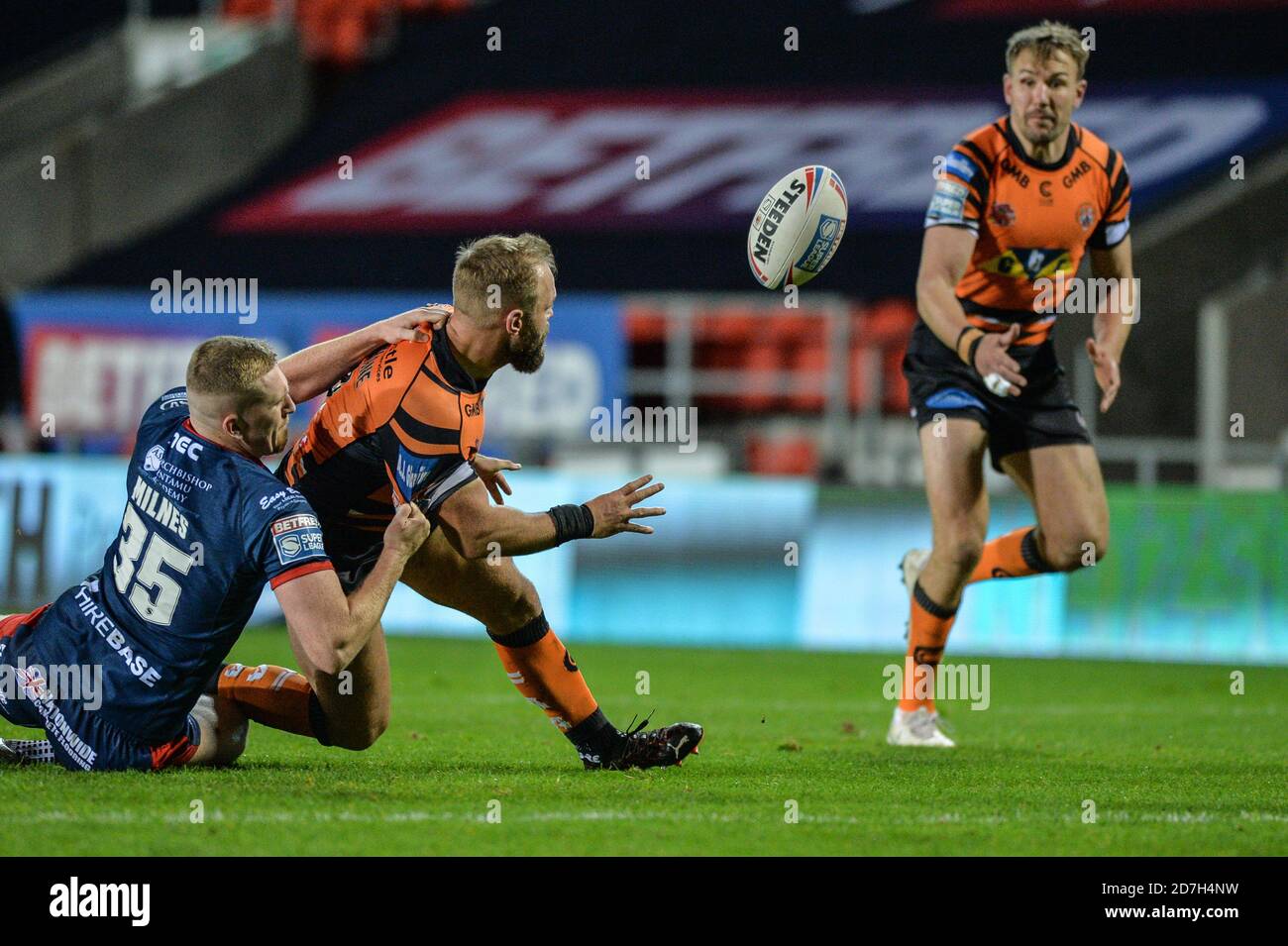 Paul McShane of Castleford Tigers releases Michael Shenton Stock Photo ...