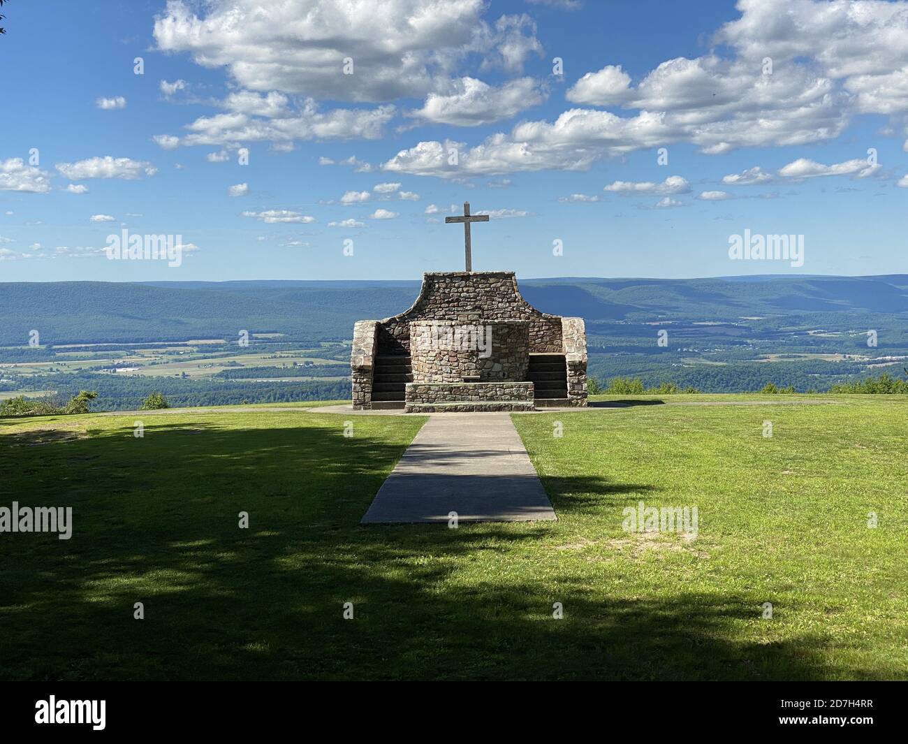 Monument of a cross at the top of village hi-res stock photography and ...