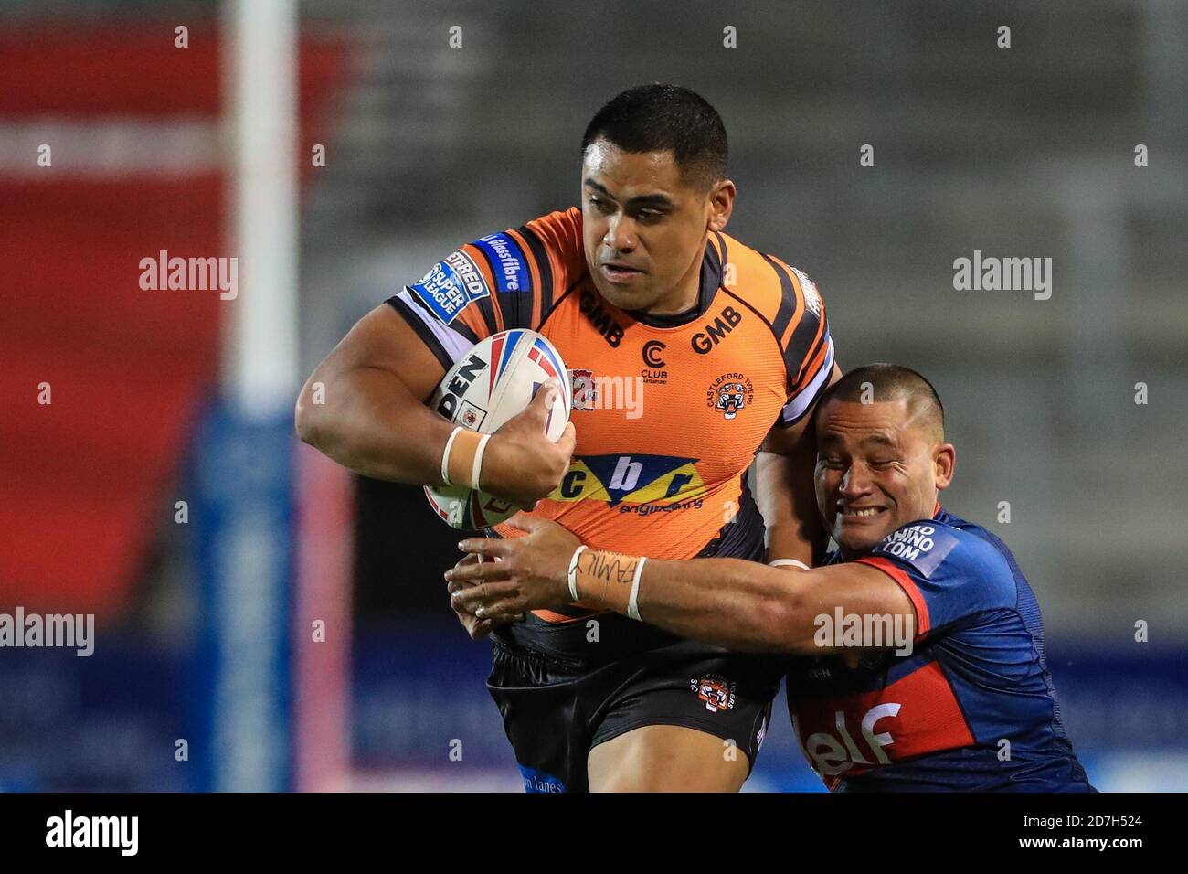 Junior Moors (20) of Castleford Tigers busts the tackle Stock Photo - Alamy