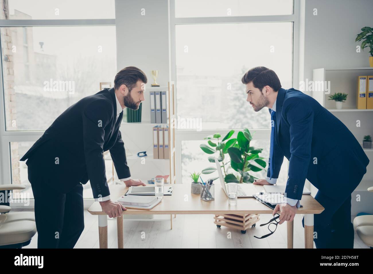 Profile side view portrait of two nice attractive handsome confident ...