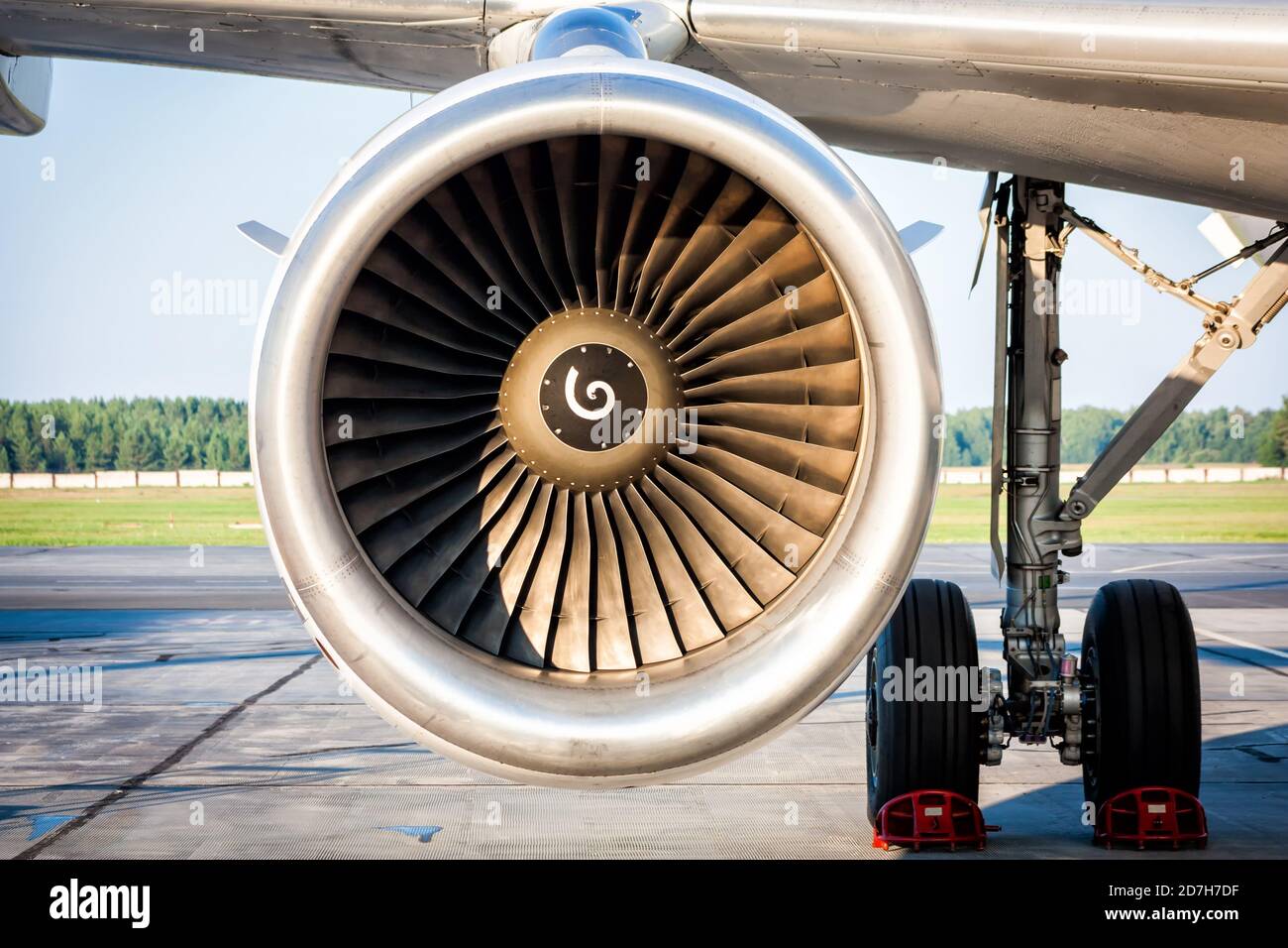 Close-up of engine and main landing gear of passenger aircraft Stock ...