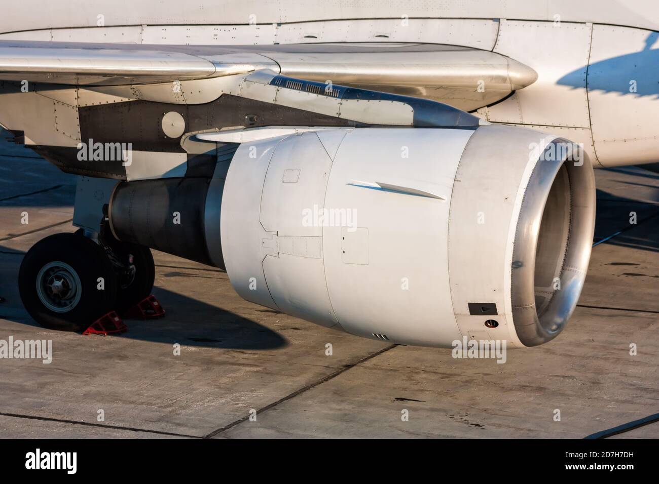 Close-up of engine and main landing gear of passenger aircraft Stock ...