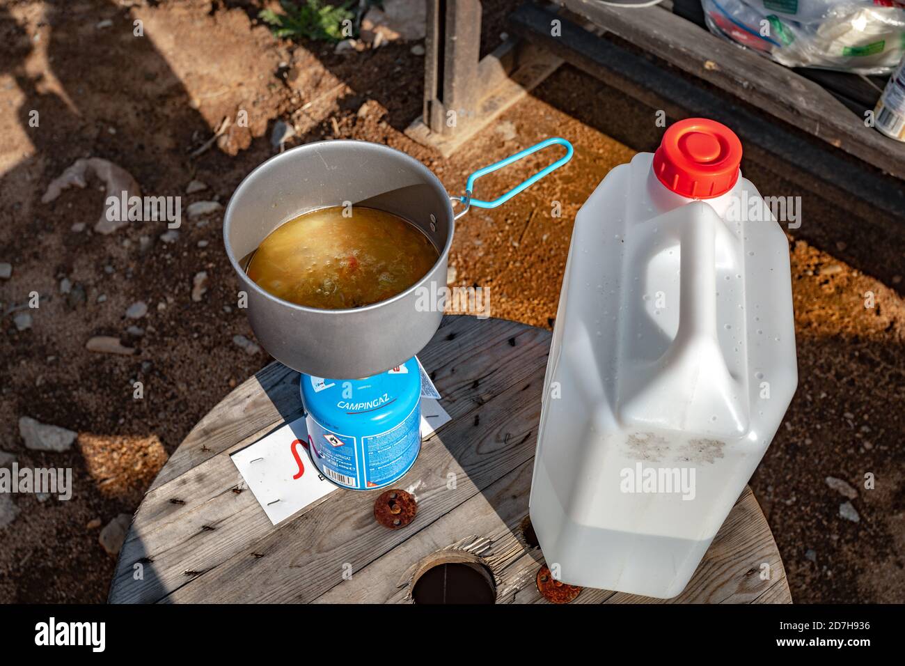 Cooking soup outdoor with camping gas tank campingaz in Sweden Stock ...