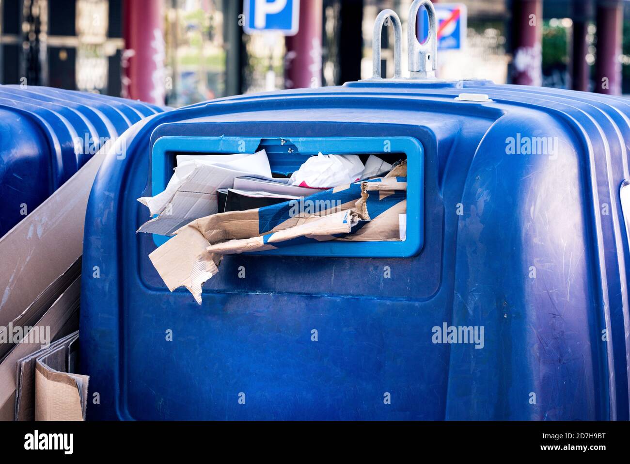 Full public paper and cardboard recycling trash container. Waste ...