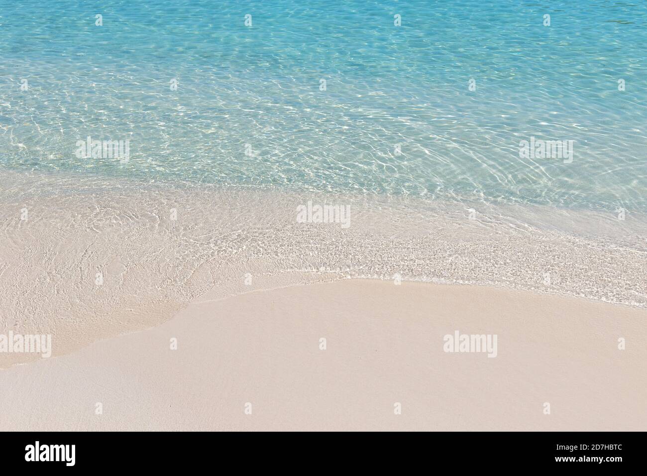 Crystal clear water and sand on beach of Ksamil in Albania, border ...