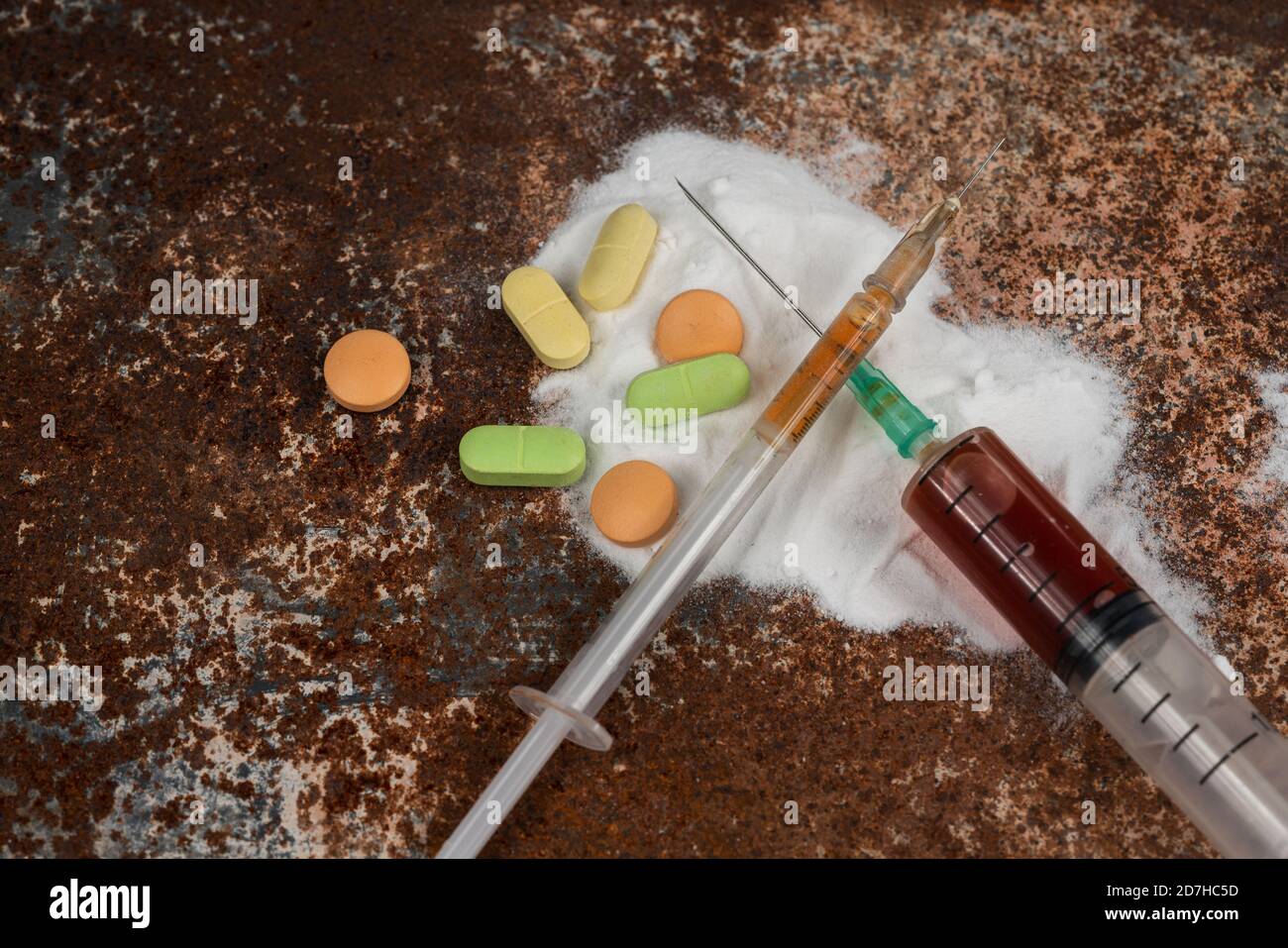 Syringe and drugs on dirty rusty background. Injection syringe ...