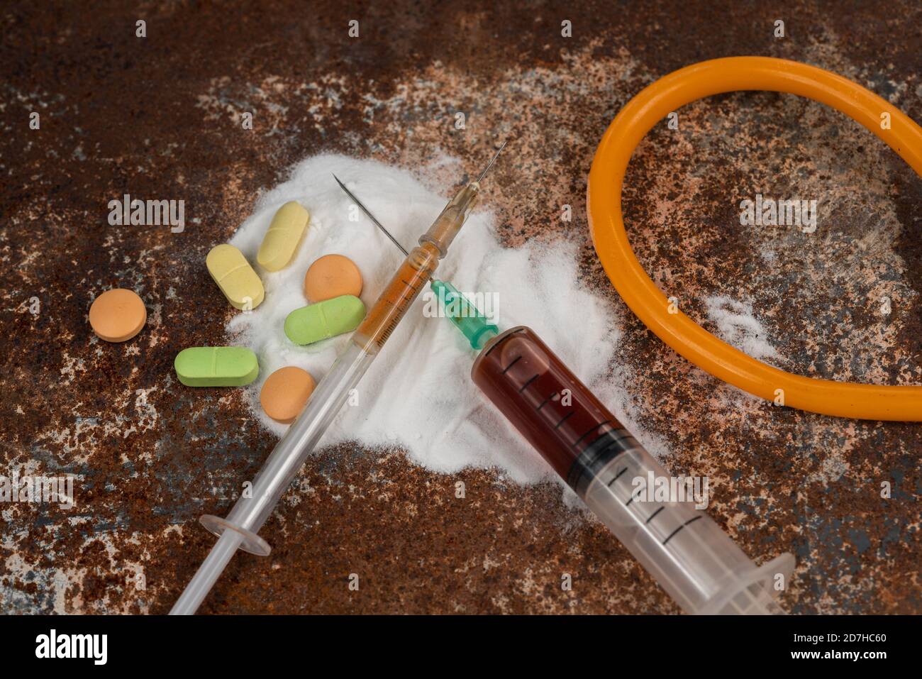 Syringe and drugs on dirty rusty background. Injection syringe ...