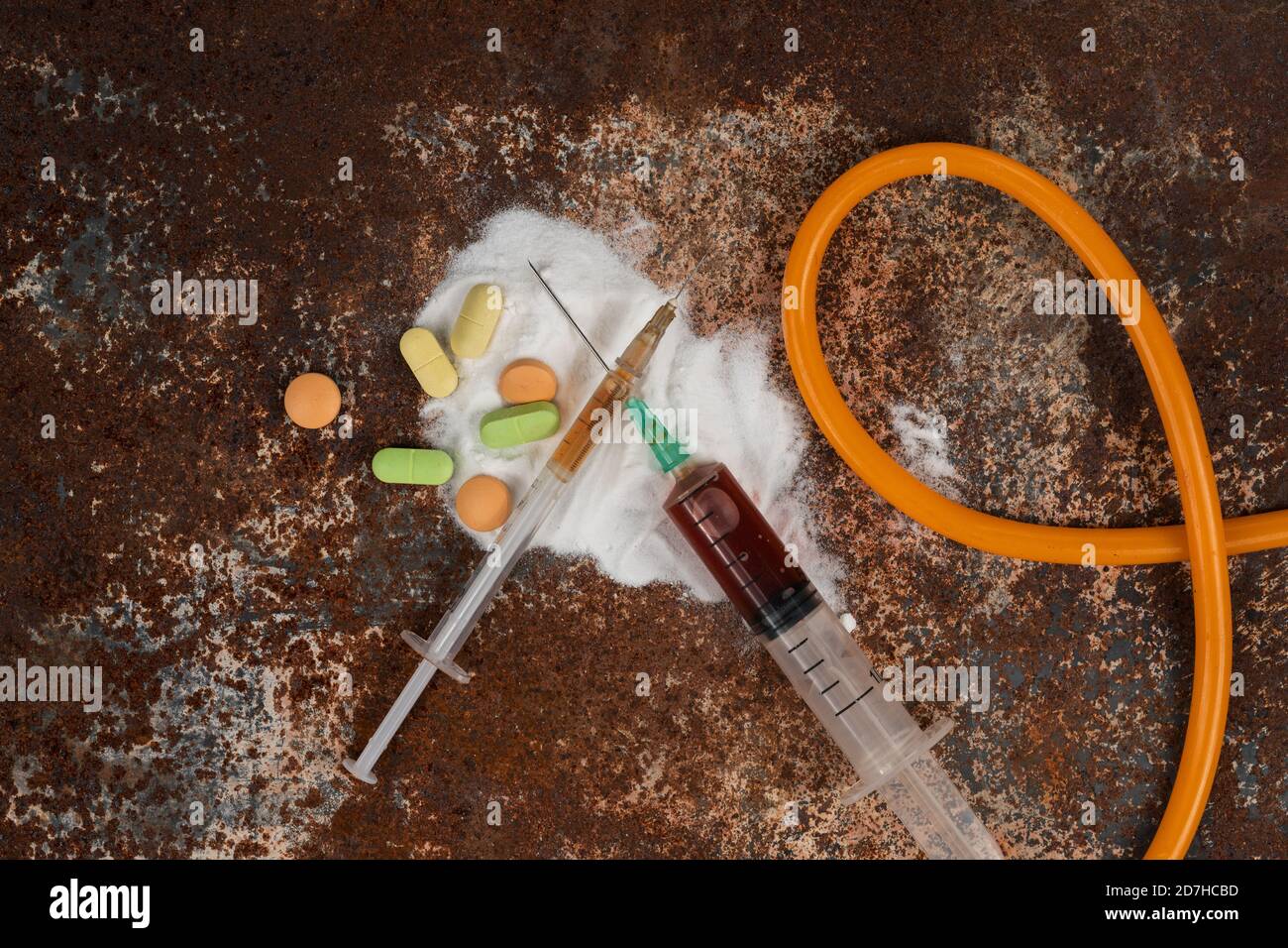 Syringe and drugs on dirty rusty background. Injection syringe ...
