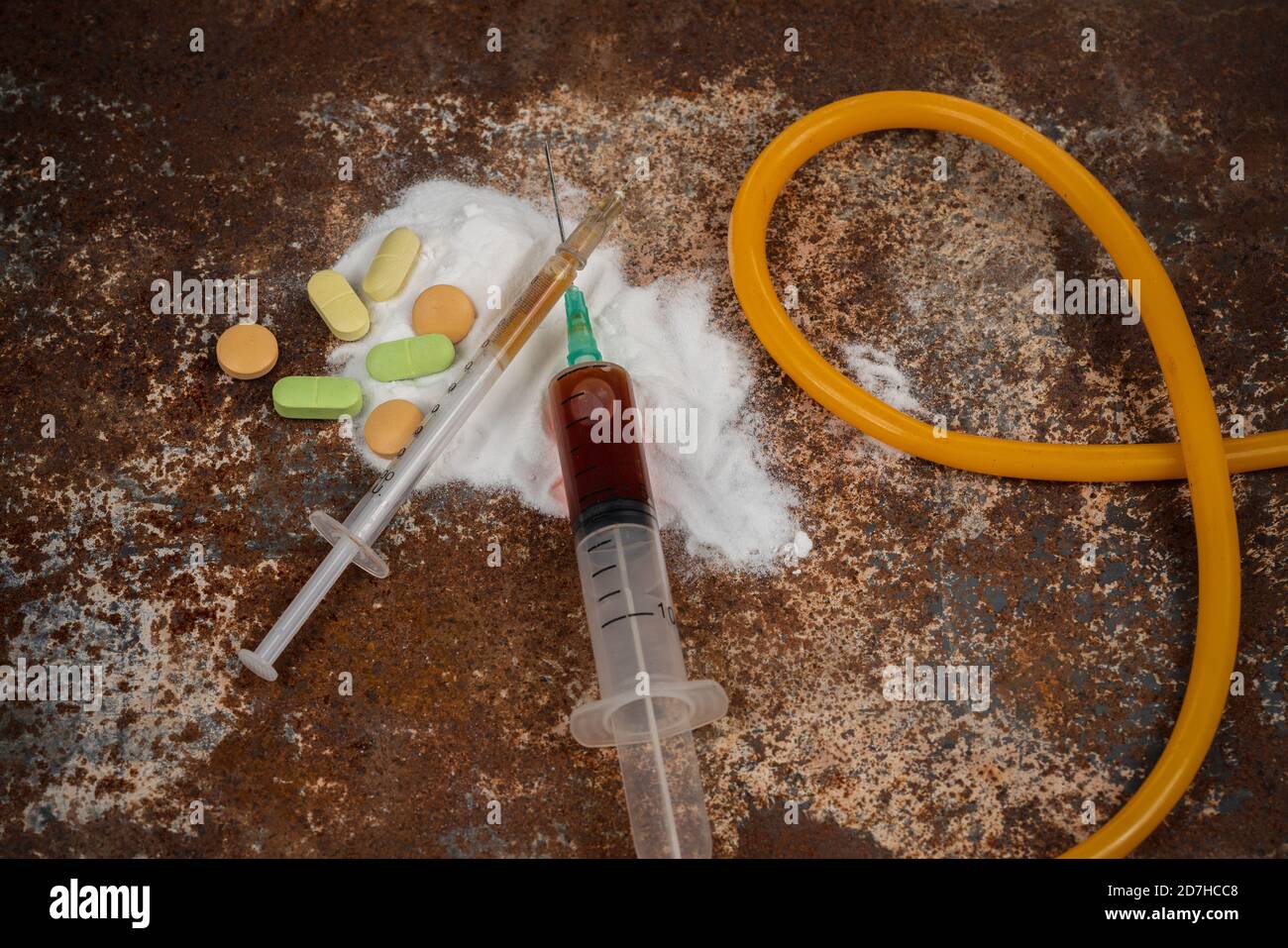 Syringe and drugs on dirty rusty background. Injection syringe ...