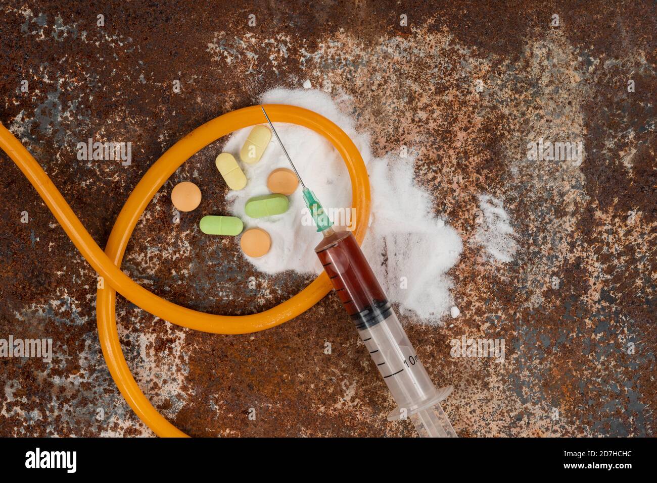 Syringe and drugs on dirty rusty background. Injection syringe ...