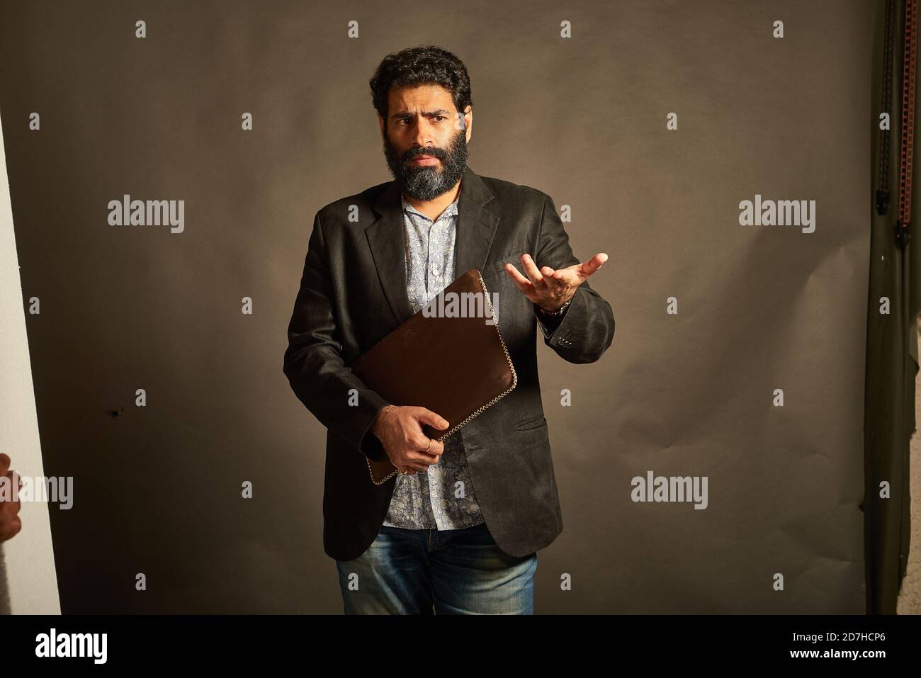 Young urban man in India in an animated discussion Stock Photo - Alamy