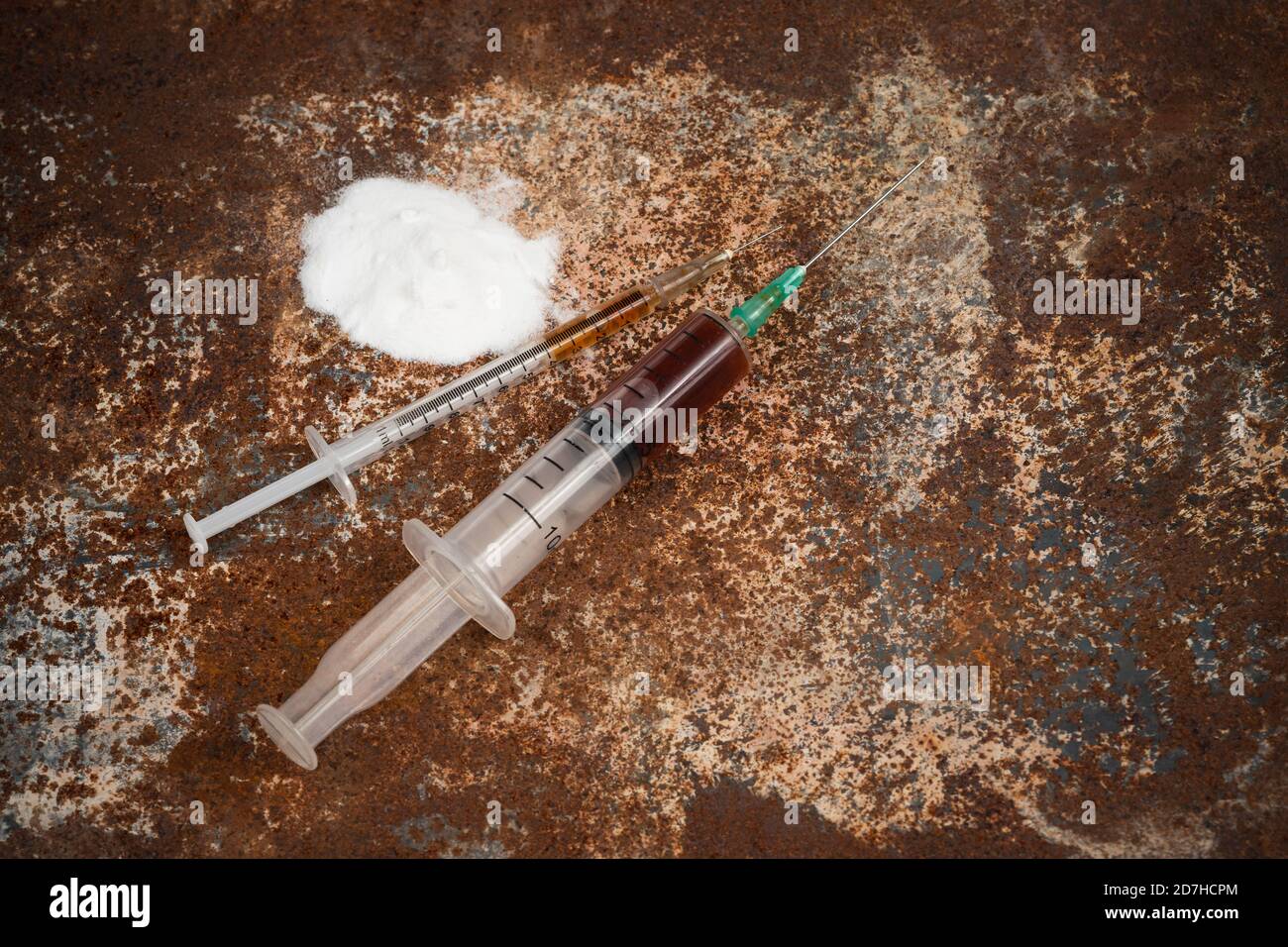 Syringe and drugs on dirty rusty background. Injection syringe ...