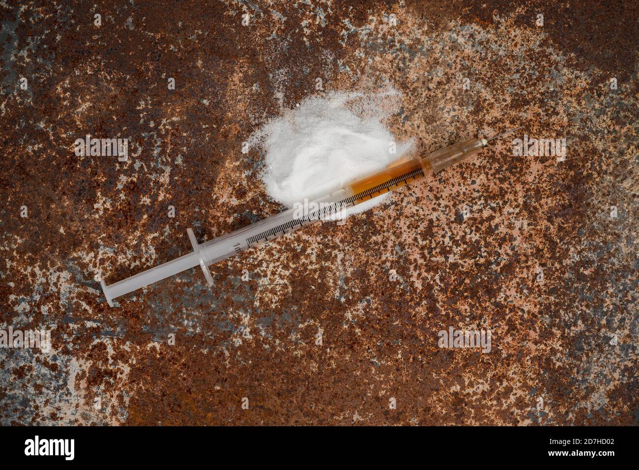 Syringe and drugs on dirty rusty background. Injection syringe ...