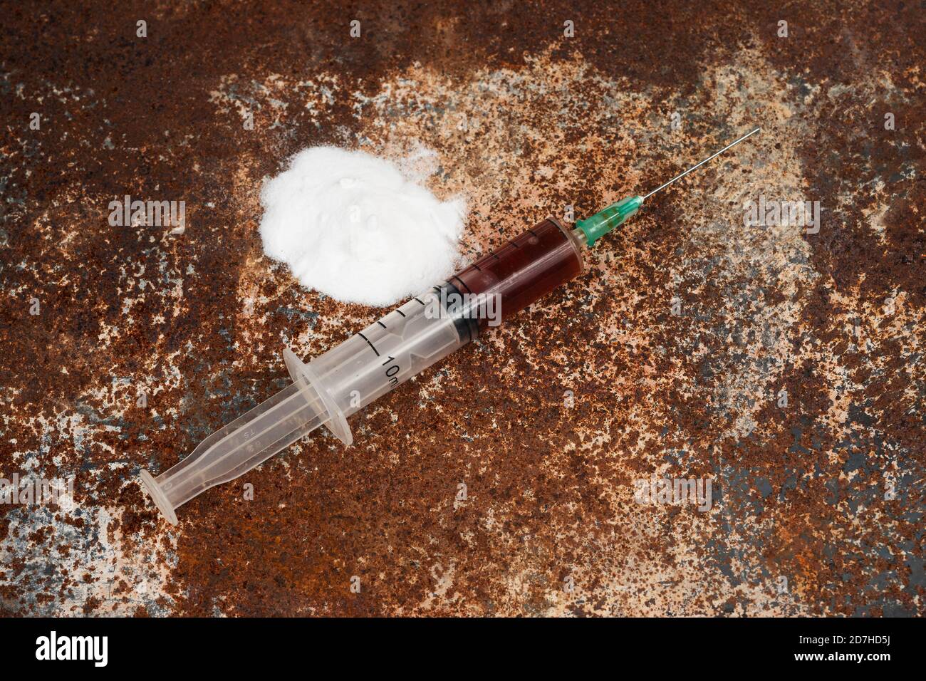 Syringe and drugs on dirty rusty background. Injection syringe ...