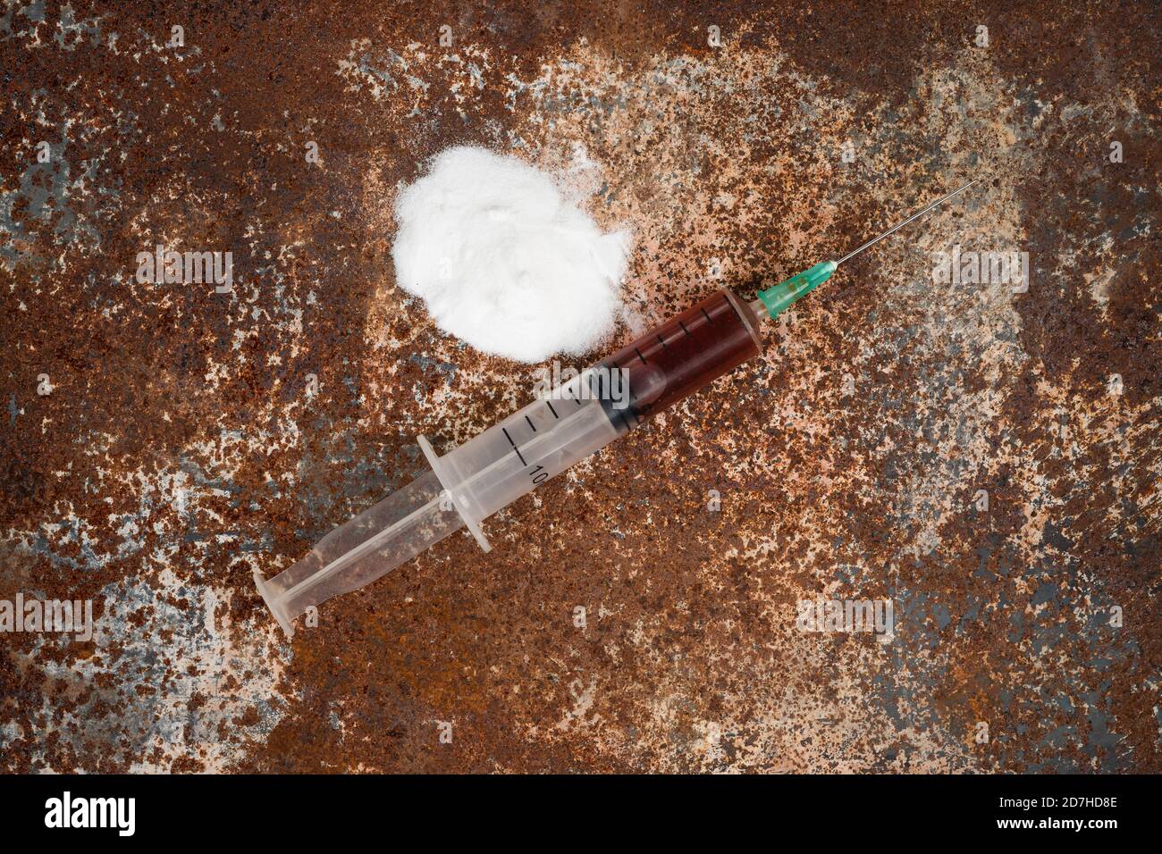 Syringe and drugs on dirty rusty background. Injection syringe ...