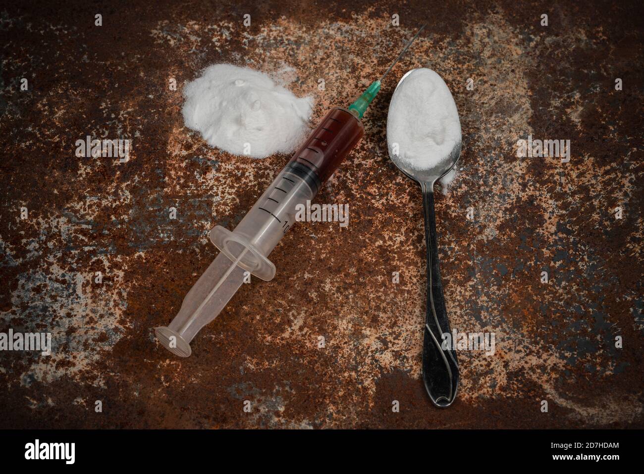Syringe and drugs on dirty rusty background. Injection syringe ...