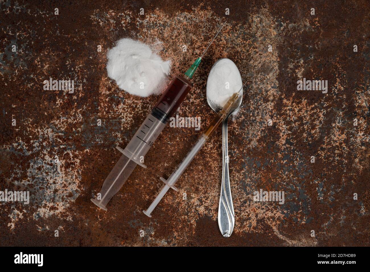 Syringe and drugs on dirty rusty background. Injection syringe ...