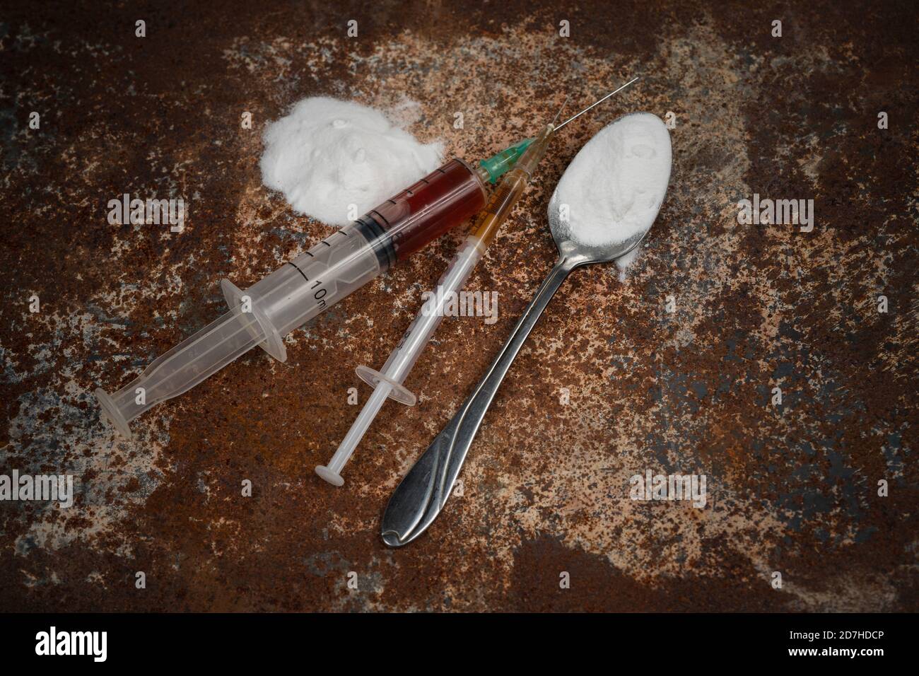Syringe and drugs on dirty rusty background. Injection syringe ...