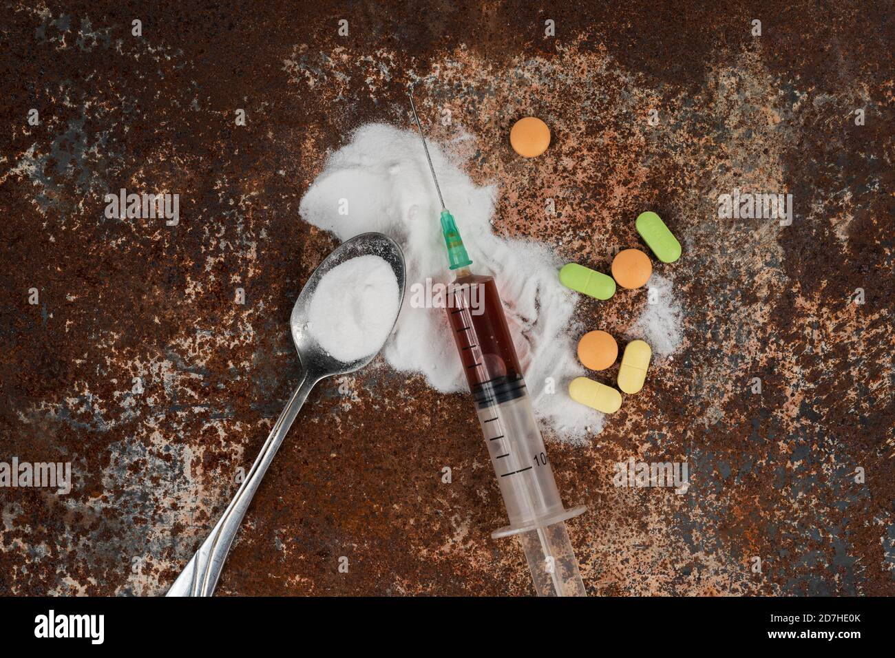 Syringe and drugs on dirty rusty background. Injection syringe ...
