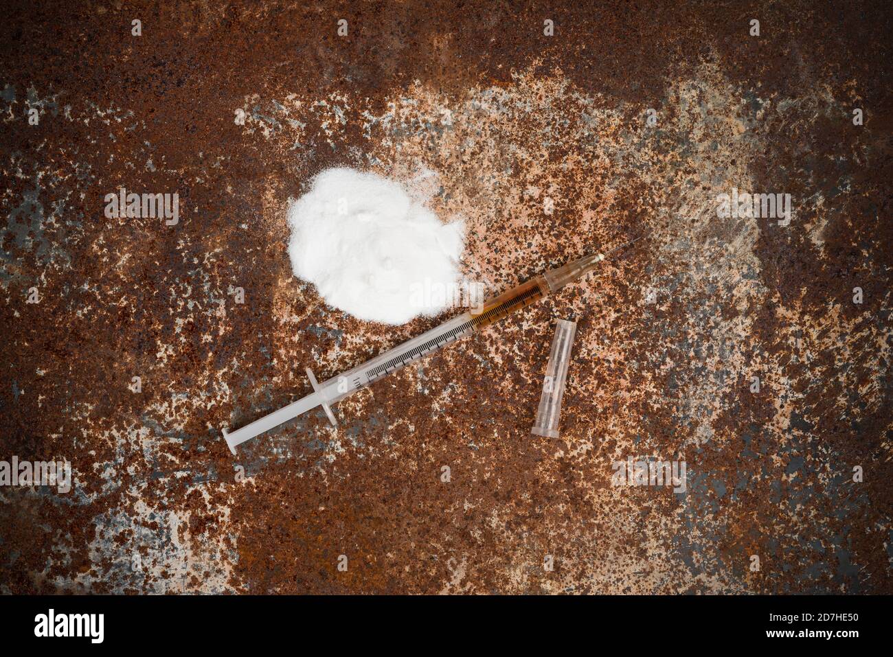 Syringe and drugs on dirty rusty background. Injection syringe ...