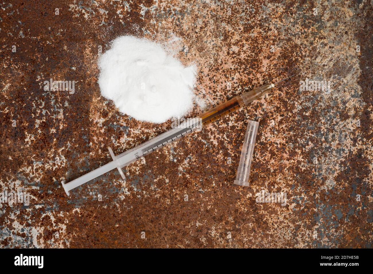 Syringe and drugs on dirty rusty background. Injection syringe ...
