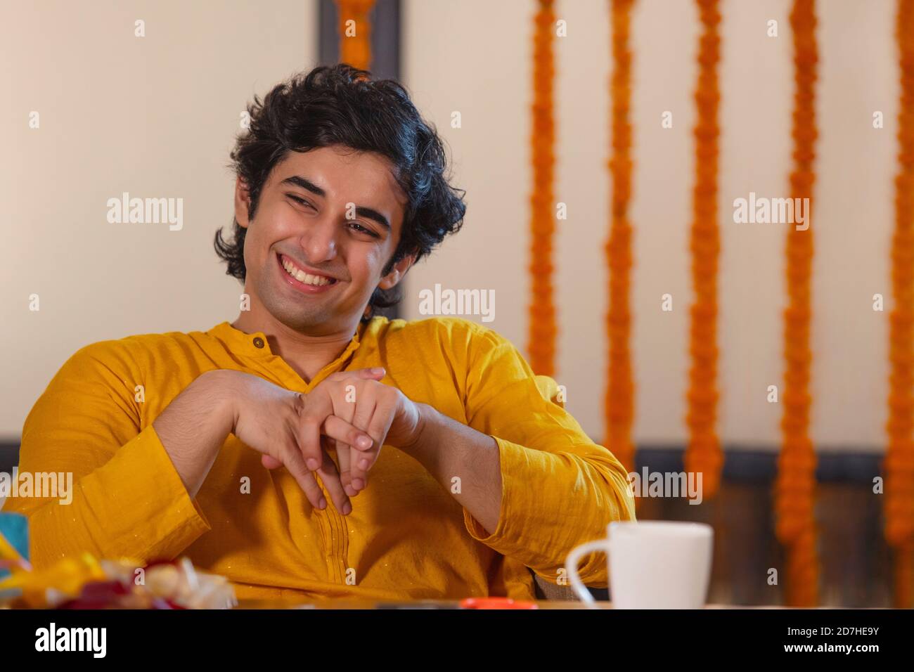 Handsome young man smiling joyfully Stock Photo - Alamy