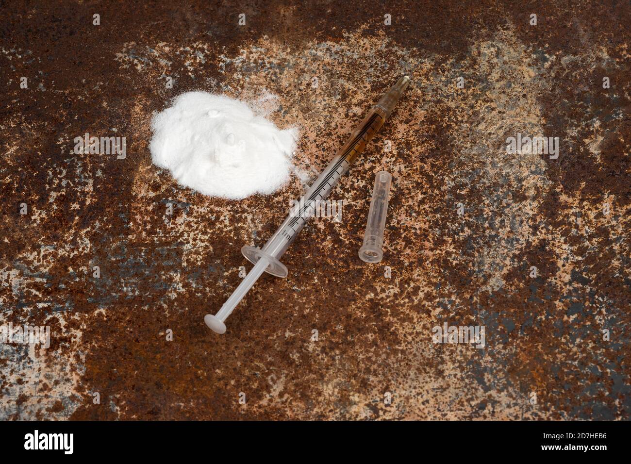 Syringe and drugs on dirty rusty background. Injection syringe ...