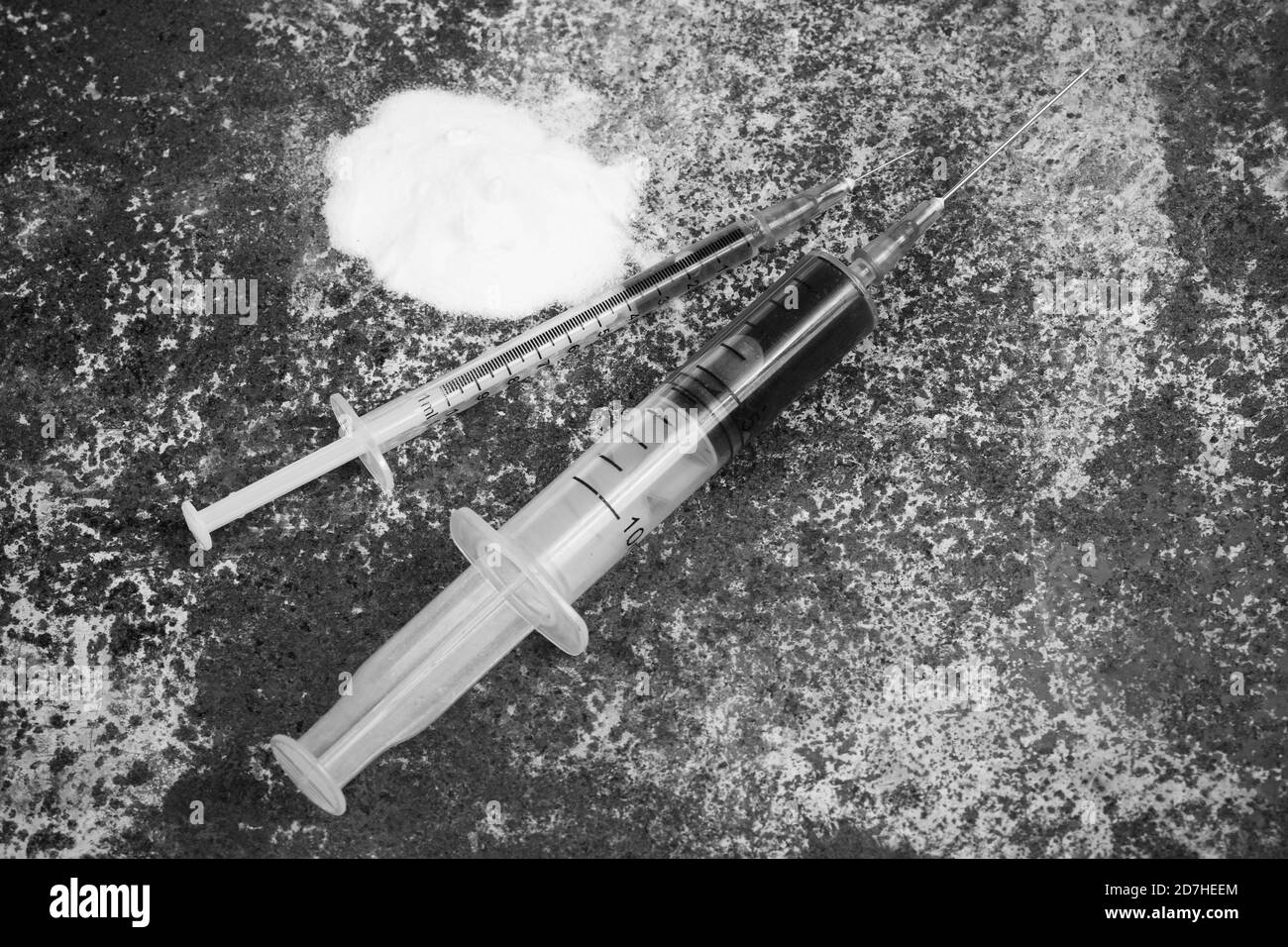 Syringe and drugs on dirty rusty background. Injection syringe ...