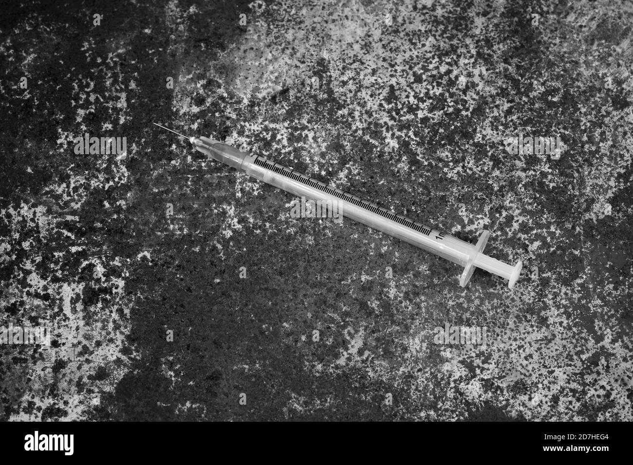 Syringe and drugs on dirty rusty background. Injection syringe ...