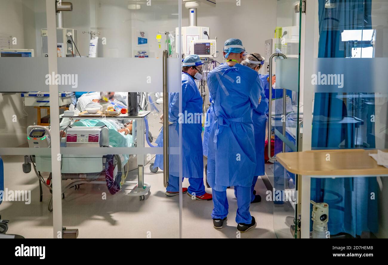 Health workers wearing full personal protective equipment (PPE) tend to ...