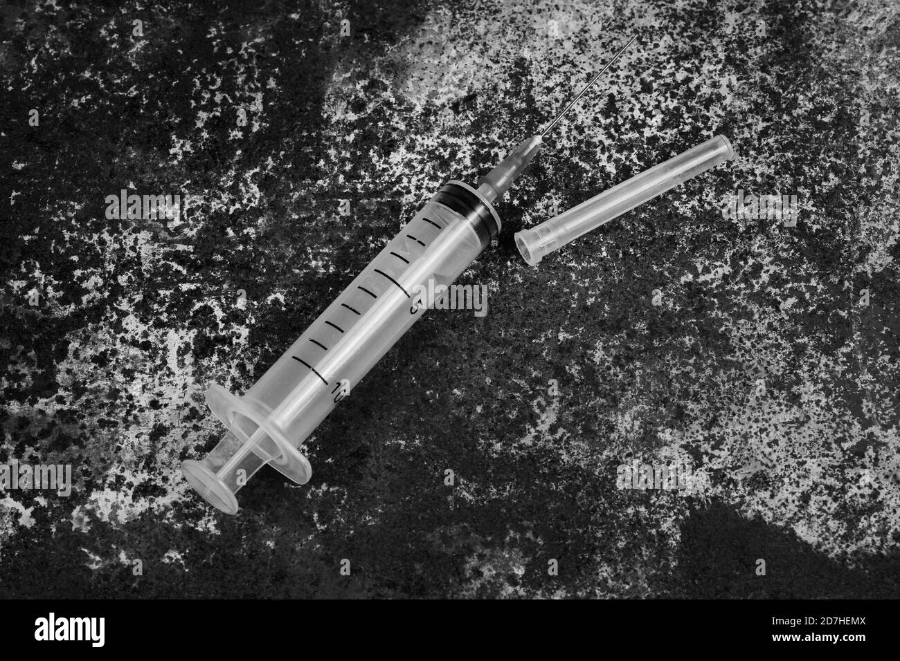 Syringe and drugs on dirty rusty background. Injection syringe ...