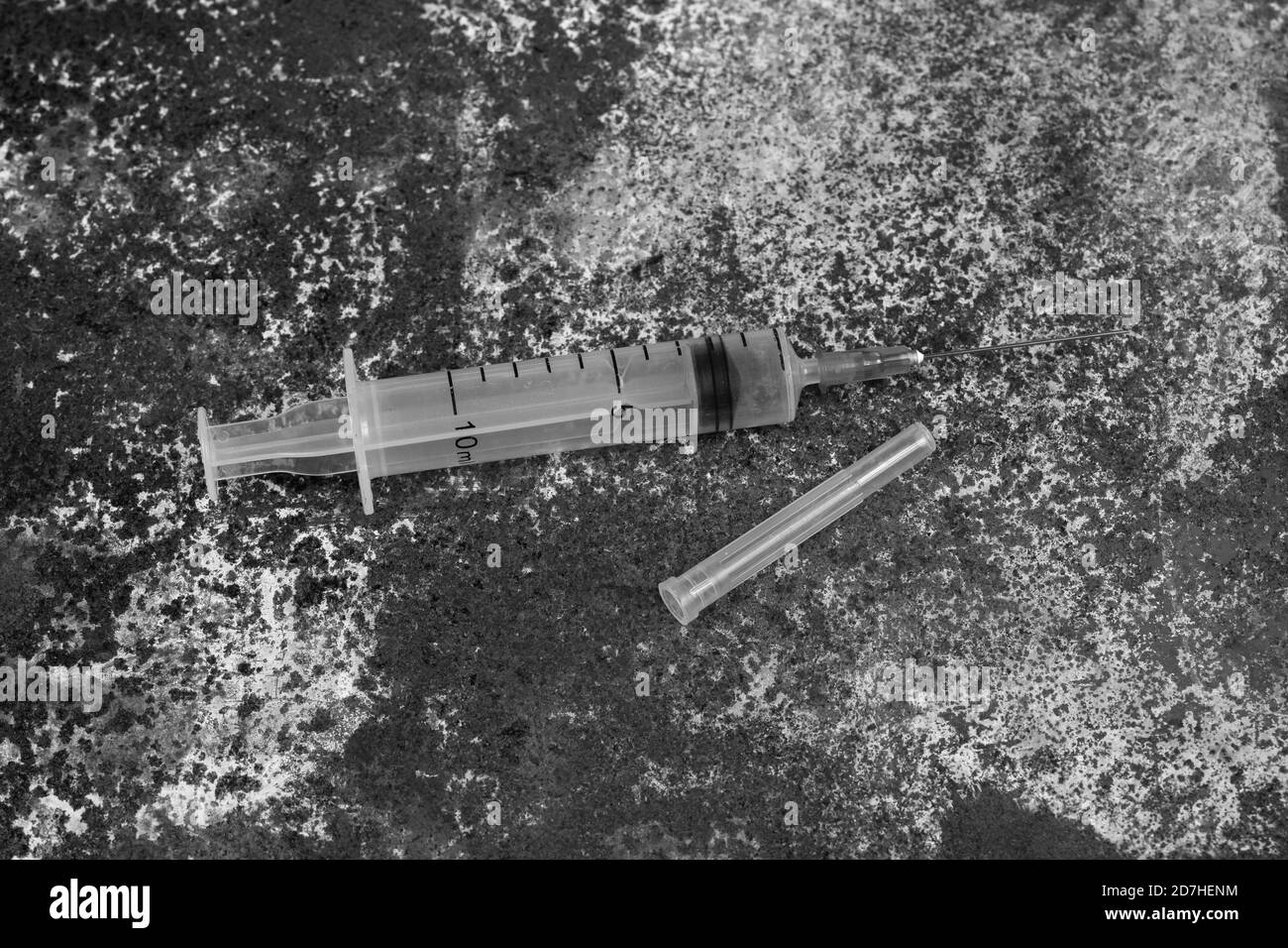 Syringe and drugs on dirty rusty background. Injection syringe ...