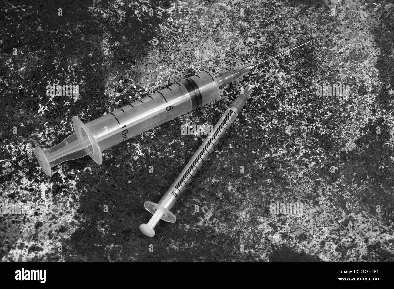 Syringe and drugs on dirty rusty background. Injection syringe ...