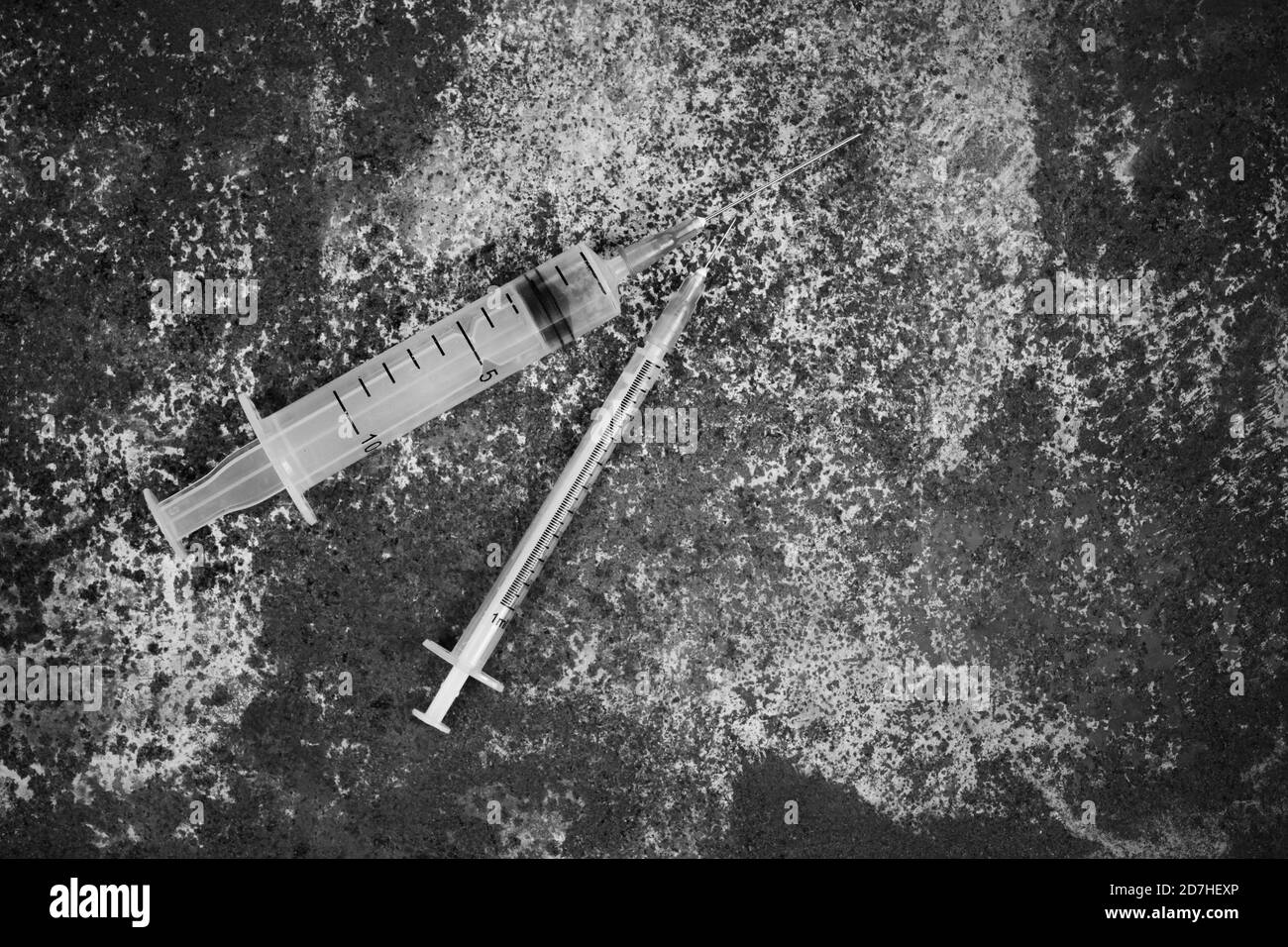 Syringe and drugs on dirty rusty background. Injection syringe ...