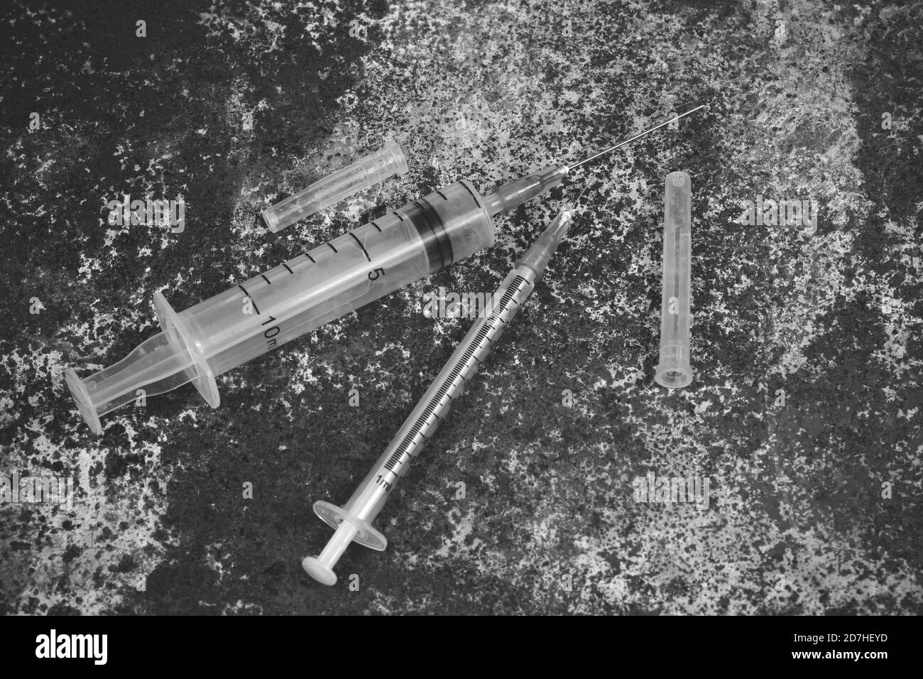 Syringe and drugs on dirty rusty background. Injection syringe ...