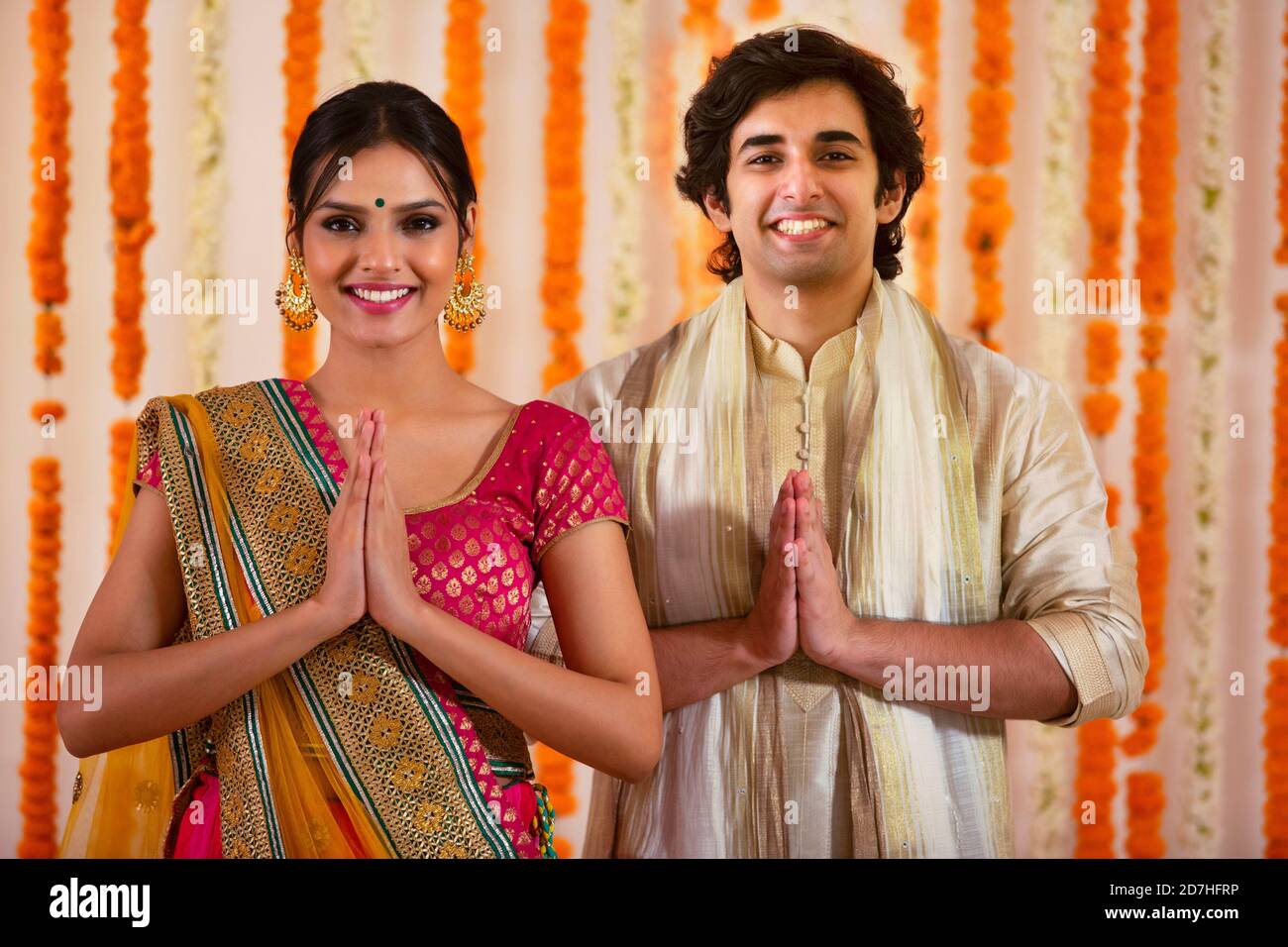 young couple welcoming together Stock Photo - Alamy