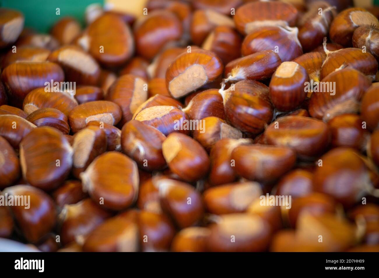 brown chestnuts in a box for sale at the market Stock Photo - Alamy